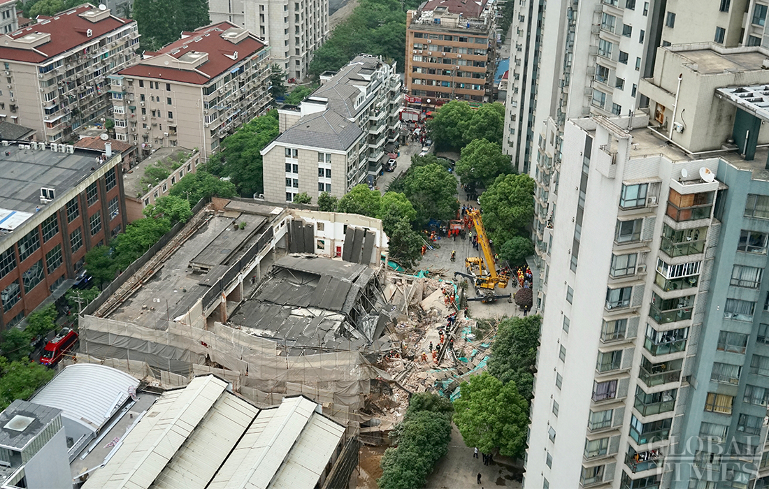 19 people rescued after a building collapsed in Shanghai on Thursday ...