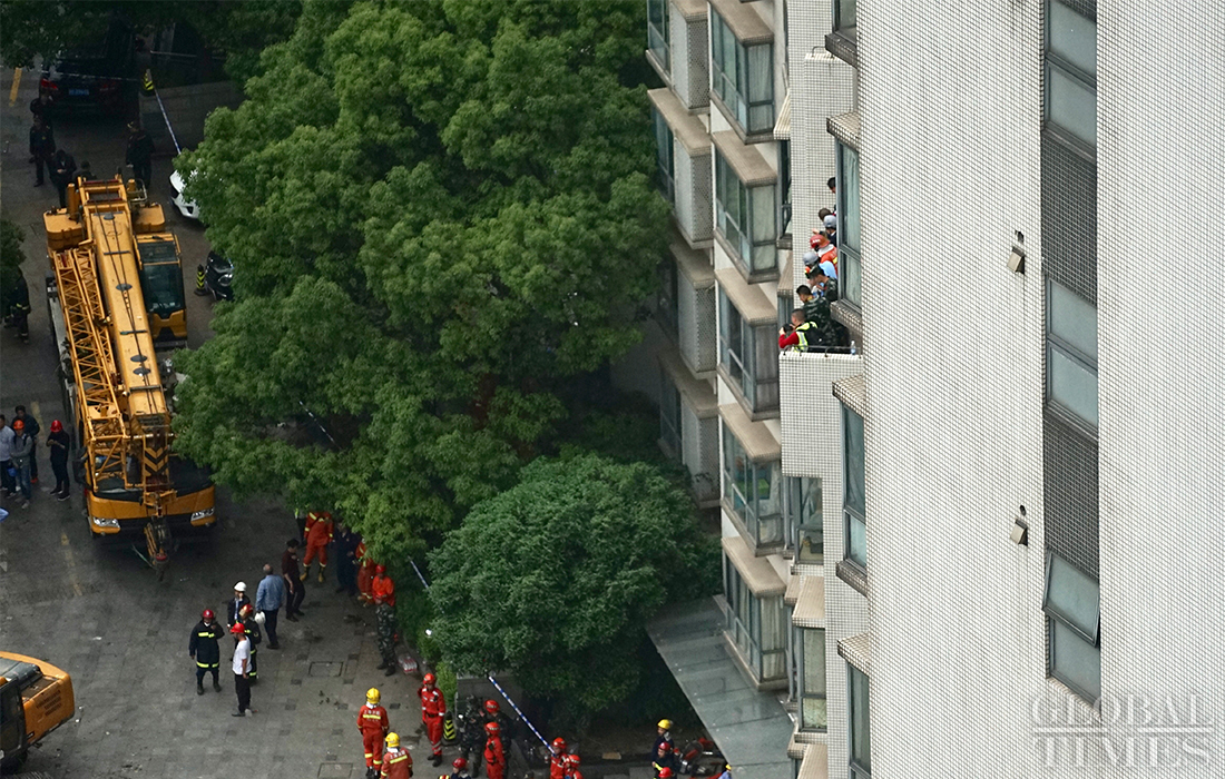 19 people rescued after a building collapsed in Shanghai on Thursday ...