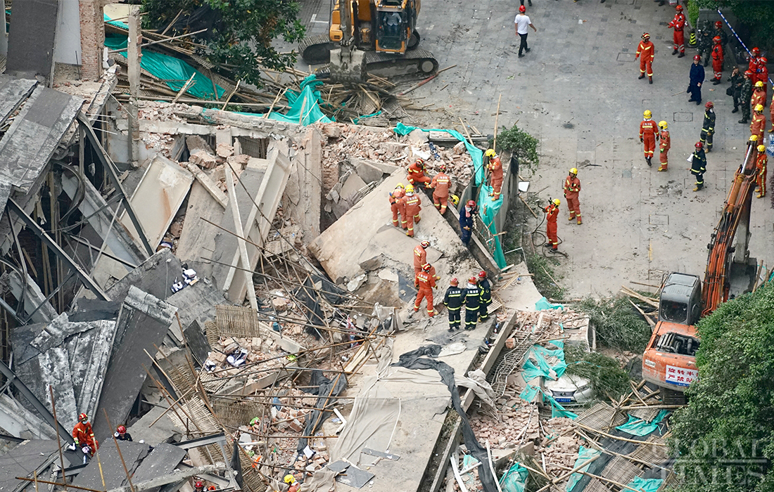 19 people rescued after a building collapsed in Shanghai on Thursday ...