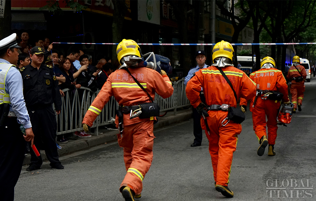 19 people rescued after a building collapsed in Shanghai on Thursday ...