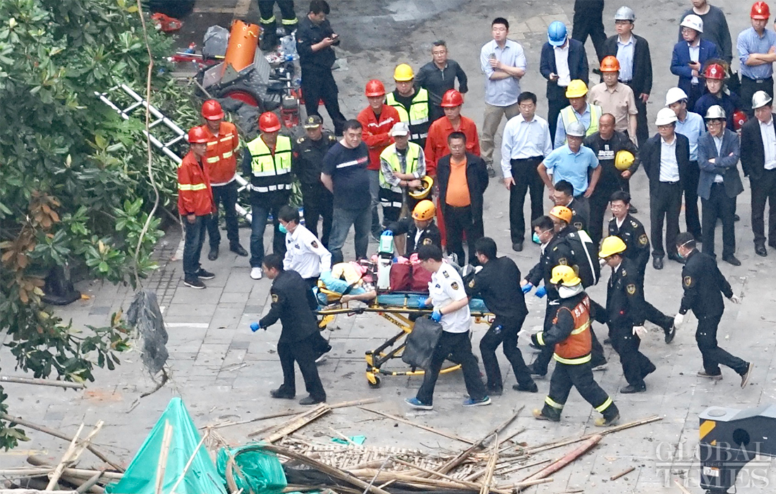 19 people rescued after a building collapsed in Shanghai on Thursday ...