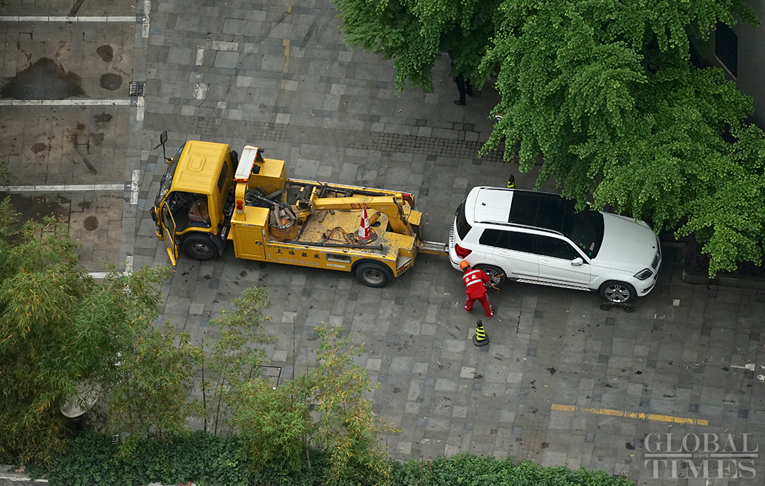 19 people rescued after a building collapsed in Shanghai on Thursday ...