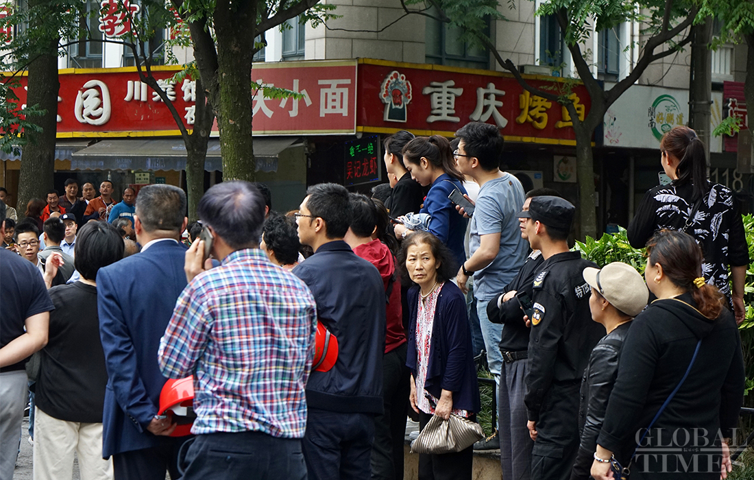 19 people rescued after a building collapsed in Shanghai on Thursday ...