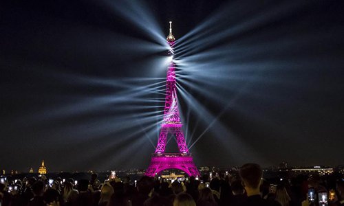 Light show performed on Eiffel Tower to celebrate its 130th anniversary ...