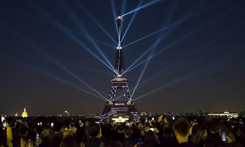 Light show performed on Eiffel Tower to celebrate its 130th anniversary ...