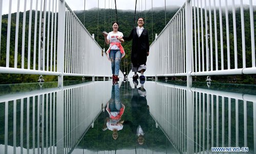View of glass bridge at Lingjiangyuan Forest Park in China's Zhejiang ...