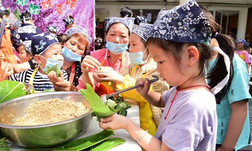 People make various kinds of Zongzi to celebrate upcoming Dragon Boat ...