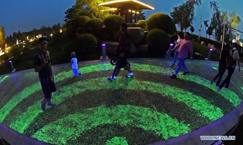 People walk on 2.5-km fluorescent walkway in Shenyang - Global Times