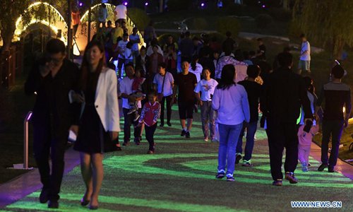 People walk on 2.5-km fluorescent walkway in Shenyang - Global Times