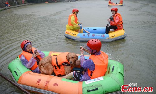 Rafting contest for dog and owner together - Global Times