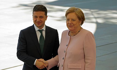 German Chancellor Merkel shaking visibly at ceremony in Berlin - Global ...