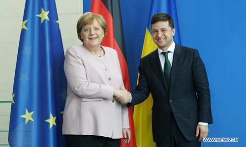 German Chancellor Merkel shaking visibly at ceremony in Berlin - Global ...