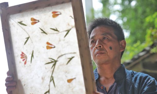 Traditional paper making in combination with cultural innovation in ...