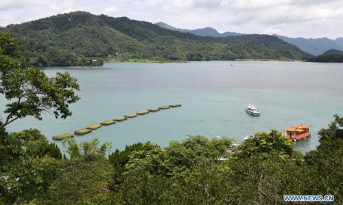 Tourists visit scenic spot of Riyue Tan in SE China's Taiwan - Global Times