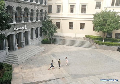 People enjoy summer time in Beijing, Shanghai - Global Times