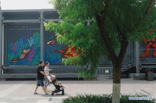 People enjoy summer time in Beijing, Shanghai - Global Times