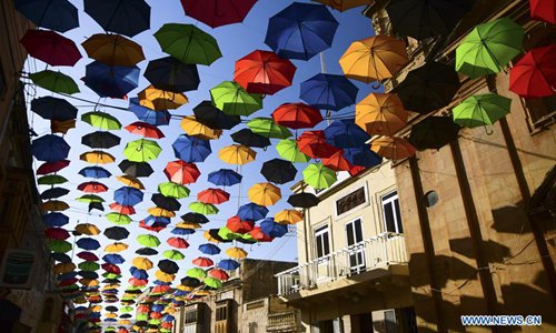 Scenery of "Umbrella Street" spectacle in Zabbar, Malta - Global Times