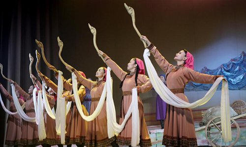 Traveling art troupe perform play blending Mongolian folk songs, dances ...