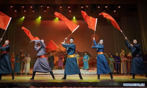 Traveling art troupe perform play blending Mongolian folk songs, dances ...