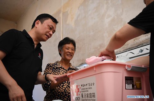 Disaster-relief packages distributed to flood victims in China's Hunan ...