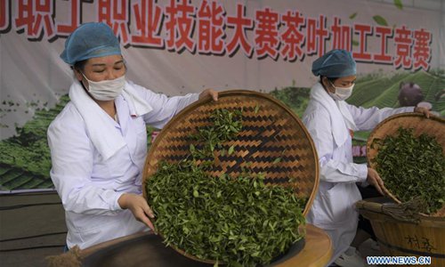 Tea stir-frying competition held in Xingye County of Yulin, China's ...