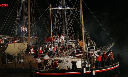 Performers in costumes reenact ancient battle between Omis pirates and ...