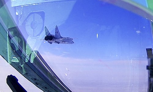 Russian modernized MiG-31BM fighters conduct stratosphere interception ...