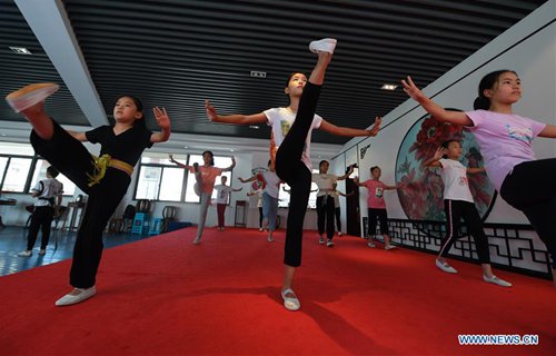 Classes set up for pupils to inherit Kun Opera culture in China's ...