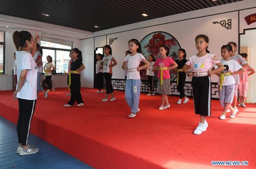 Classes set up for pupils to inherit Kun Opera culture in China's ...