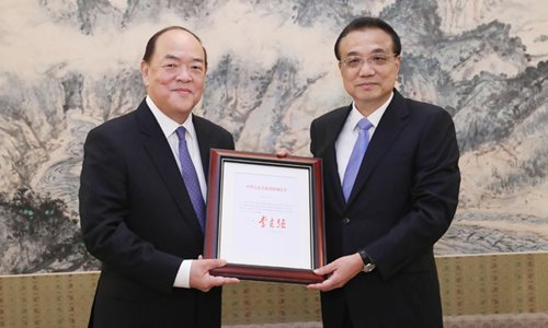 Premier Li meets Macao's new chief executive - Global Times