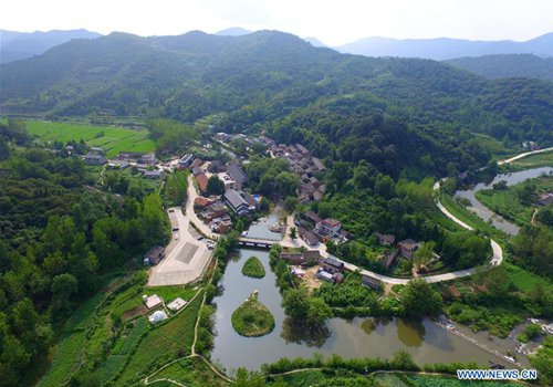 Henan's Xinyang pursues path of green development - Global Times