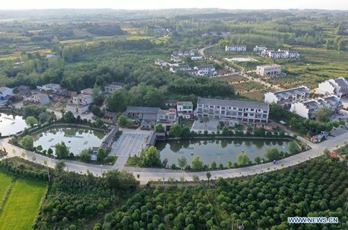 Henan's Xinyang pursues path of green development - Global Times