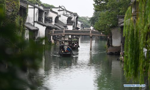 China's Wuzhen attracts tourists - Global Times