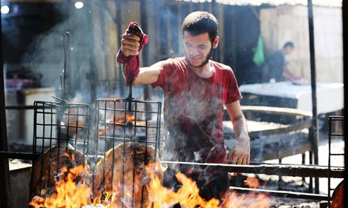 Want a taste of Iraq's gourmet food? Try the specially grilled carp ...