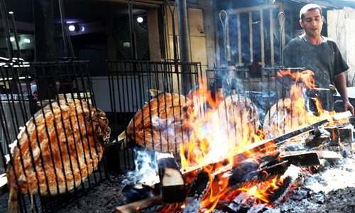 Want a taste of Iraq's gourmet food? Try the specially grilled carp ...