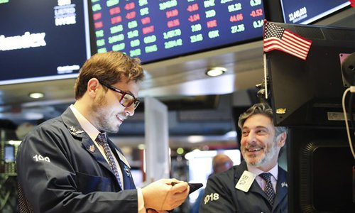 US stocks rise after Fed cuts rates - Global Times