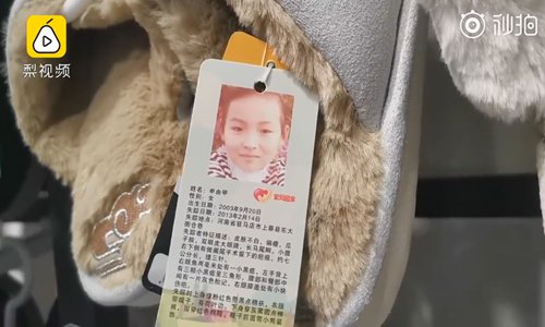 Salesman puts missing children info on slippers' tags - Global Times