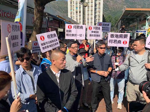 Junius Ho appears at campaign event after surviving knife attack ...