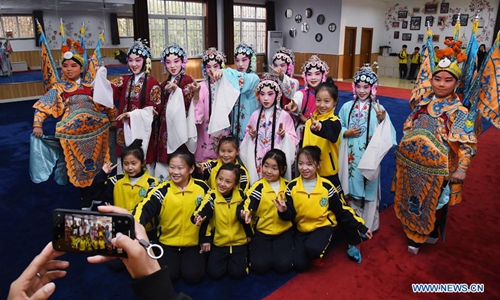 Schools establish Peking Opera interest clubs in Qingdao, E China ...