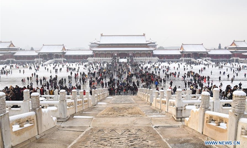Beijing embraces timely first snow - Global Times