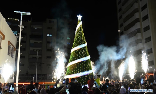 Palestinian Christians attend Christmas tree lighting ceremony in Gaza ...