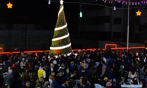 Palestinian Christians attend Christmas tree lighting ceremony in Gaza ...
