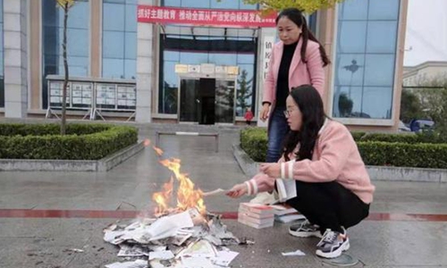Library employees burning books to be investigated - Global Times