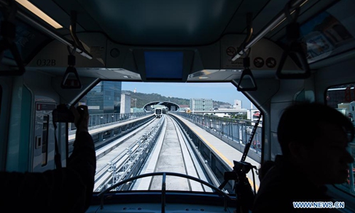 Light rail opens to public in China's Macao - Global Times