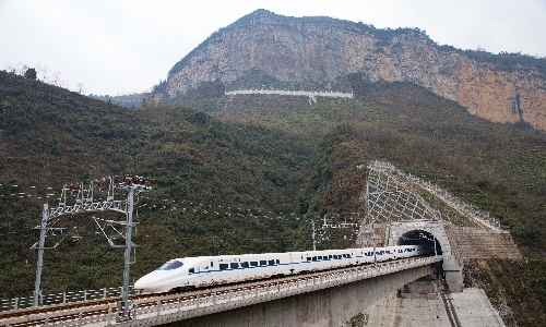 A high-speed railway is put into operation with nearly half of its ...