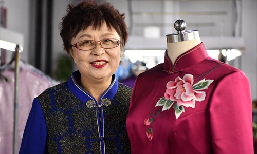 Pic story: inheritor of Laomeihua's Qipao making technique - Global Times
