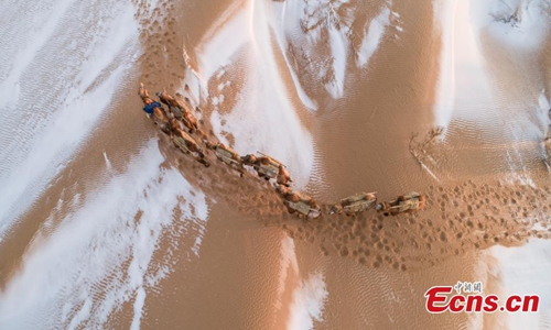 Snow creates stunning desert scene in Inner Mongolia - Global Times