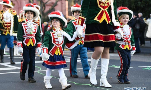 People participate in New Year's parade in Mainz, Germany - Global Times