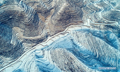 Aerial view of snow-covered terraced fields in N China's Hebei - Global ...