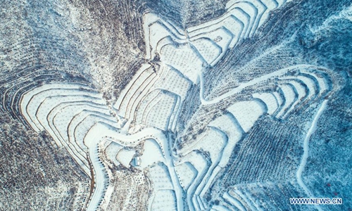 Aerial view of snow-covered terraced fields in N China's Hebei - Global ...